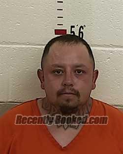 Recent Booking / Mugshot for JUSTIN R ROMO in San Miguel County, New Mexico