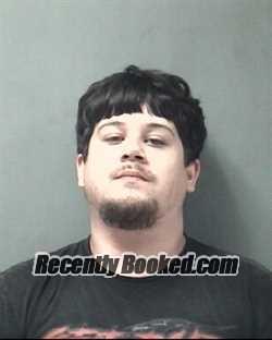 Recent Booking / Mugshot for RAY CALIXTRO GARCIA in Galveston County, Texas