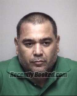 Recent Booking / Mugshot for CARLOS . ROMAN in Galveston County, Texas