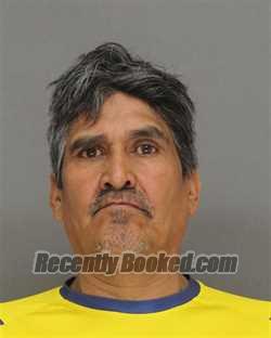 Recent Booking / Mugshot for MARCOS NMI MORENO-RODRIGUEZ in Brown ...