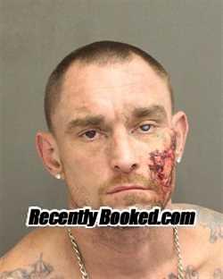 Recent Booking / Mugshot for TRAVIS CARLIN CHARL ZIPPERER in Orange ...