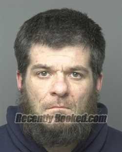 Recent Booking / Mugshot for TRAVIS ROBERT BOTTOMS in Dubuque County, Iowa